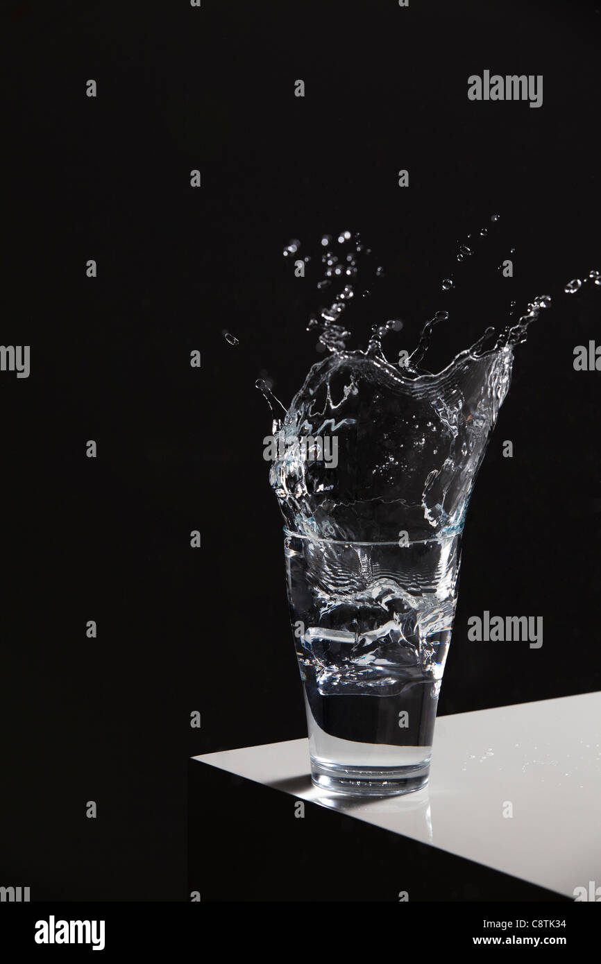 Water Splashing In A Glass Stock Photo - Alamy