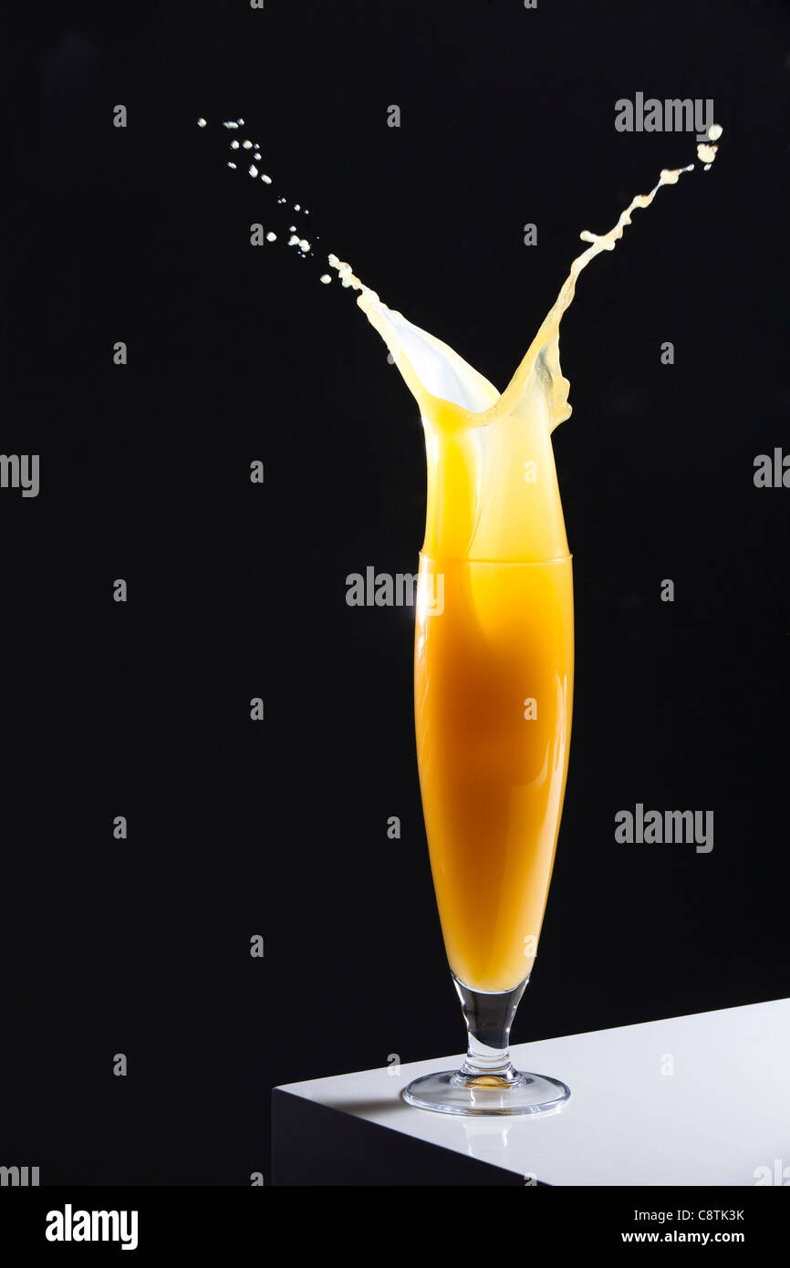 Drink Splashing In A Glass Stock Photo - Alamy