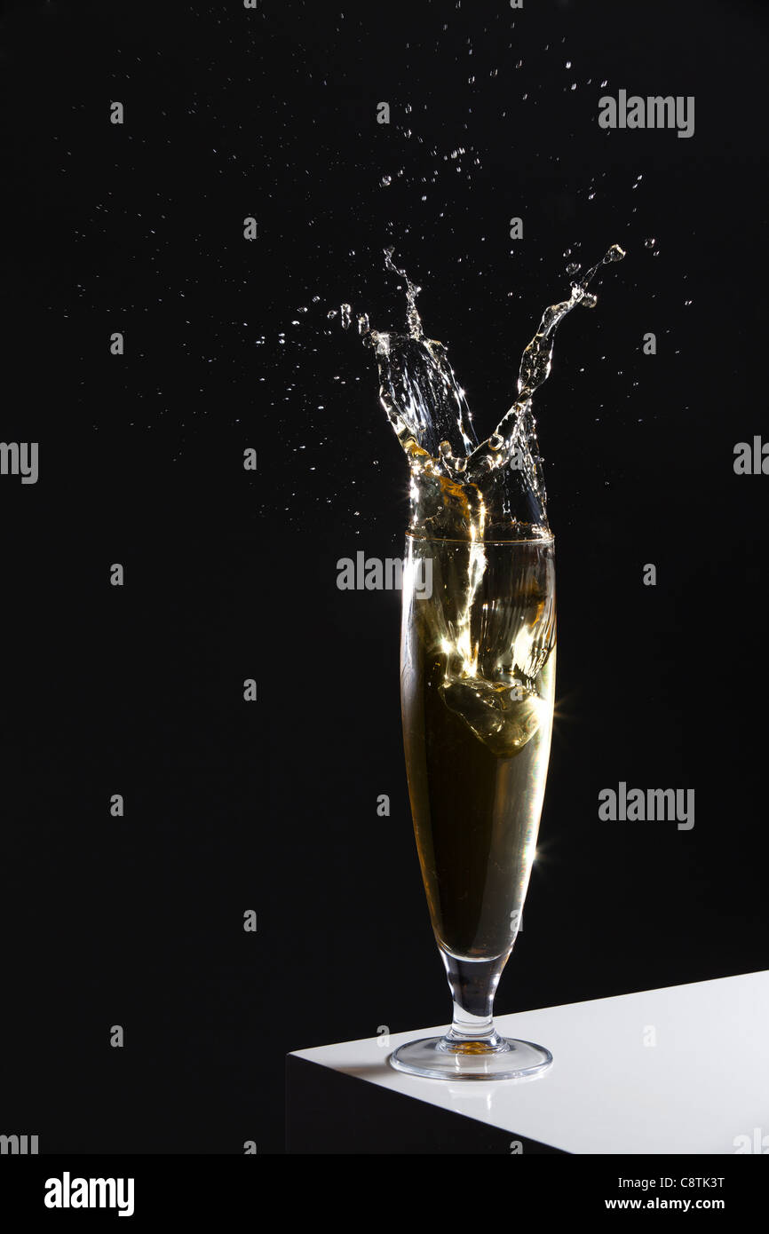 Drink Splashing In A Glass Stock Photo - Alamy