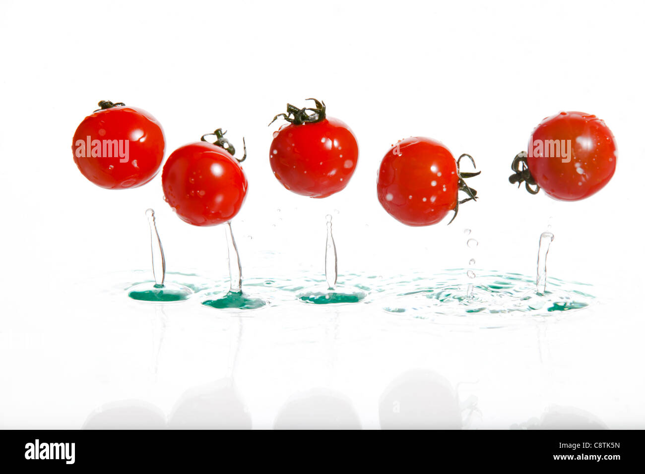 Tomato Splashing In Water Stock Photo - Alamy