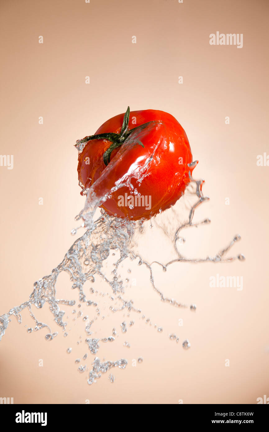 Tomato Splashing In Water Stock Photo - Alamy