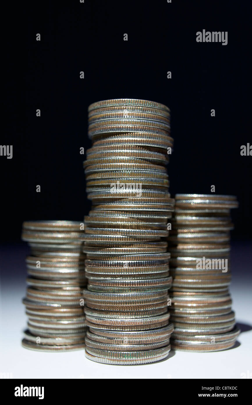 Studio shot of stacks of coins Stock Photo - Alamy