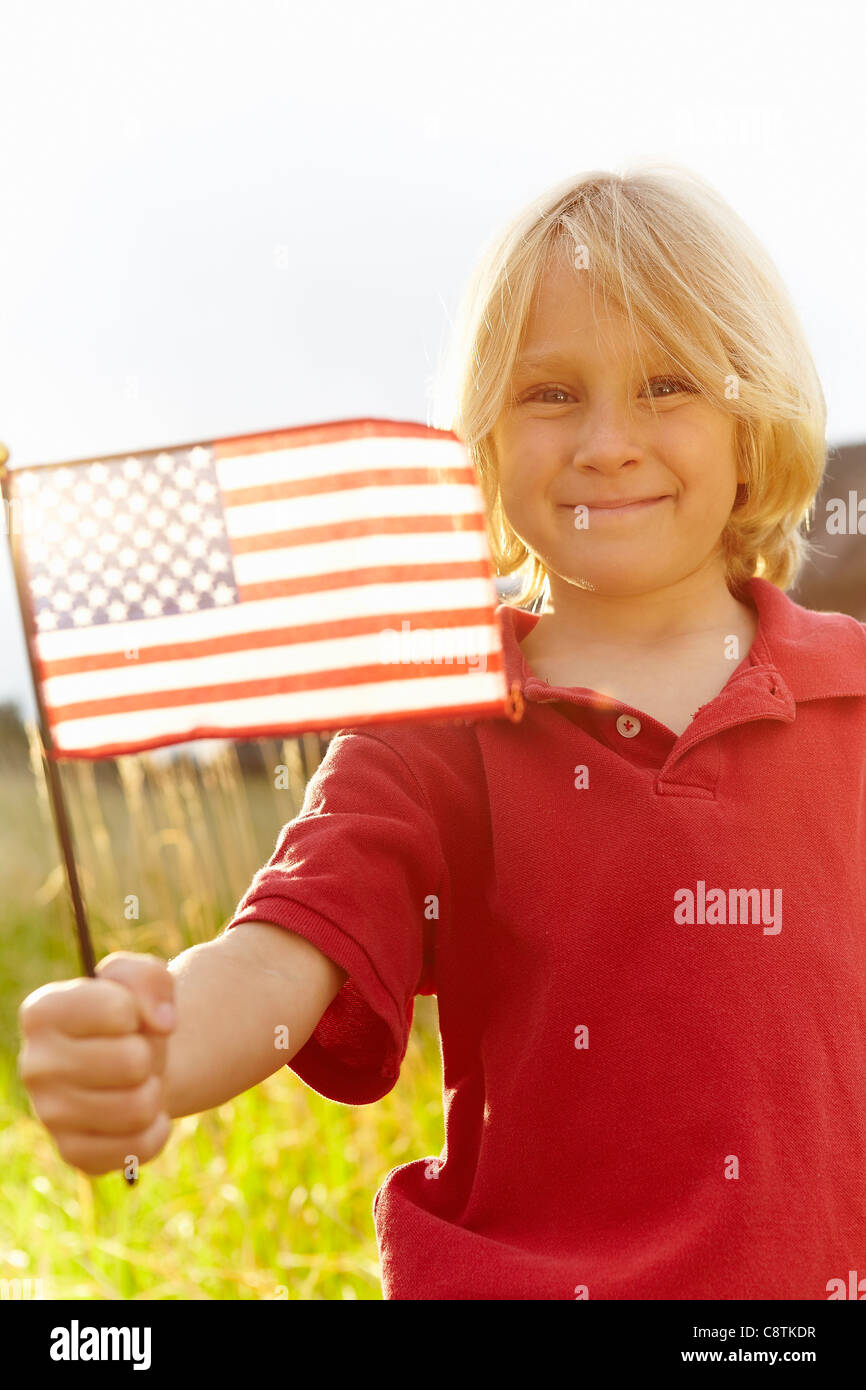 Boy waving flag hi-res stock photography and images - Alamy