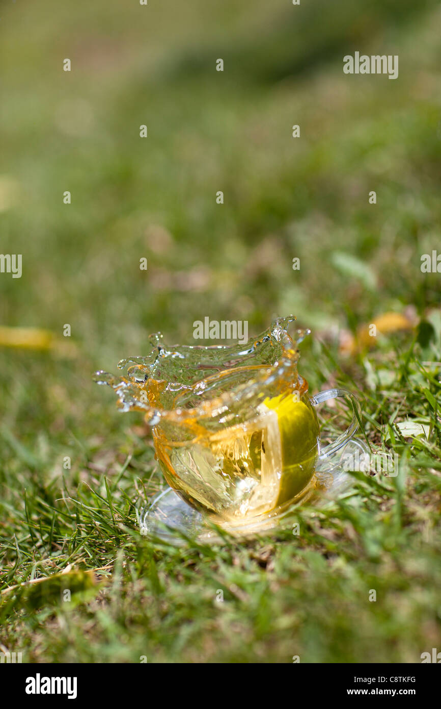 Drink Splashing In A Cup Stock Photo - Alamy