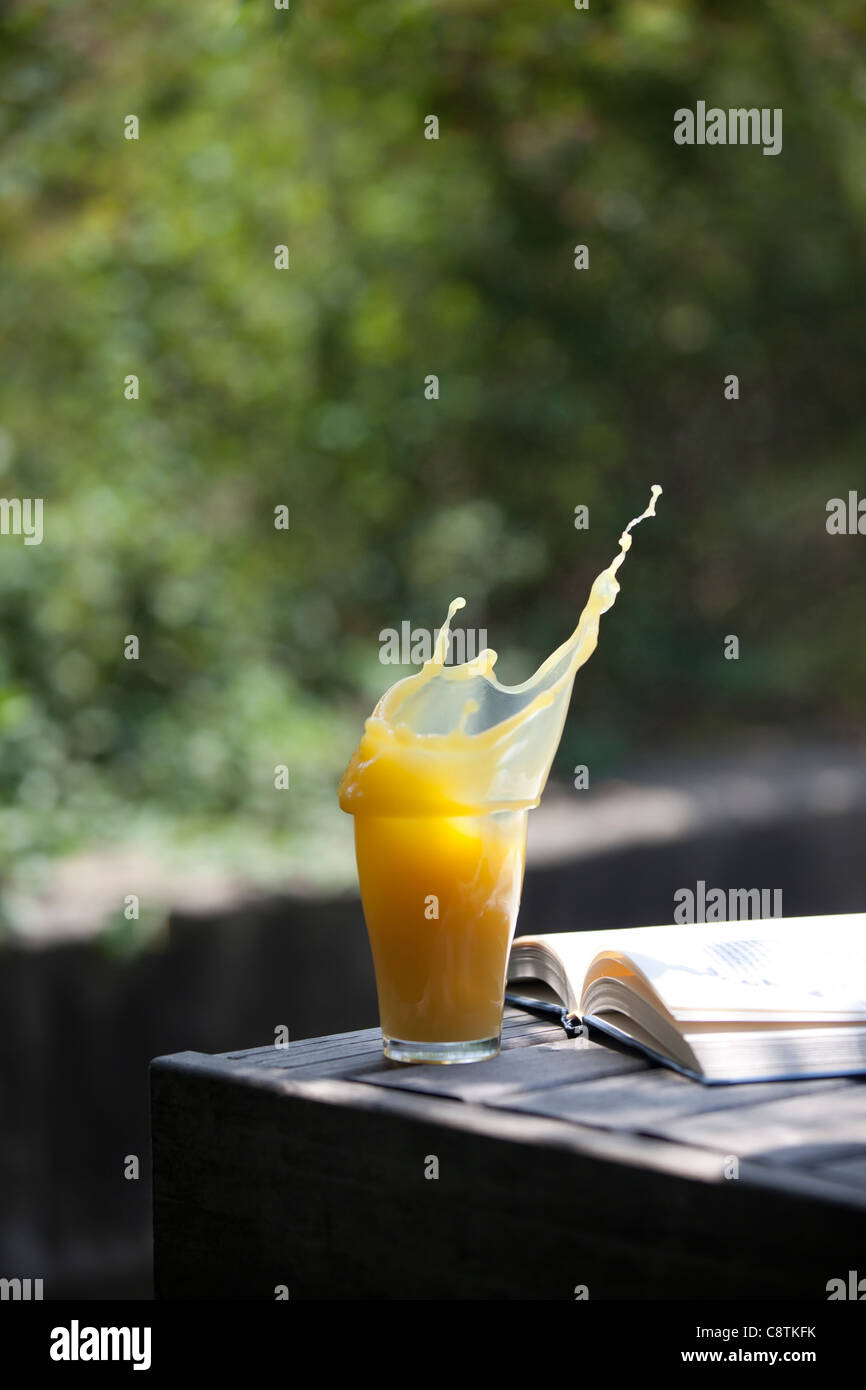 Drink Splashing In A Glass Stock Photo - Alamy