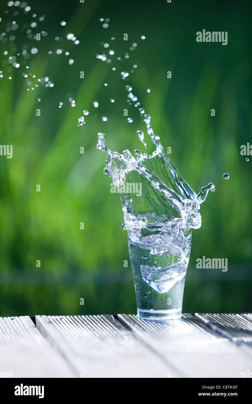 Water Splashing In A Glass Stock Photo - Alamy