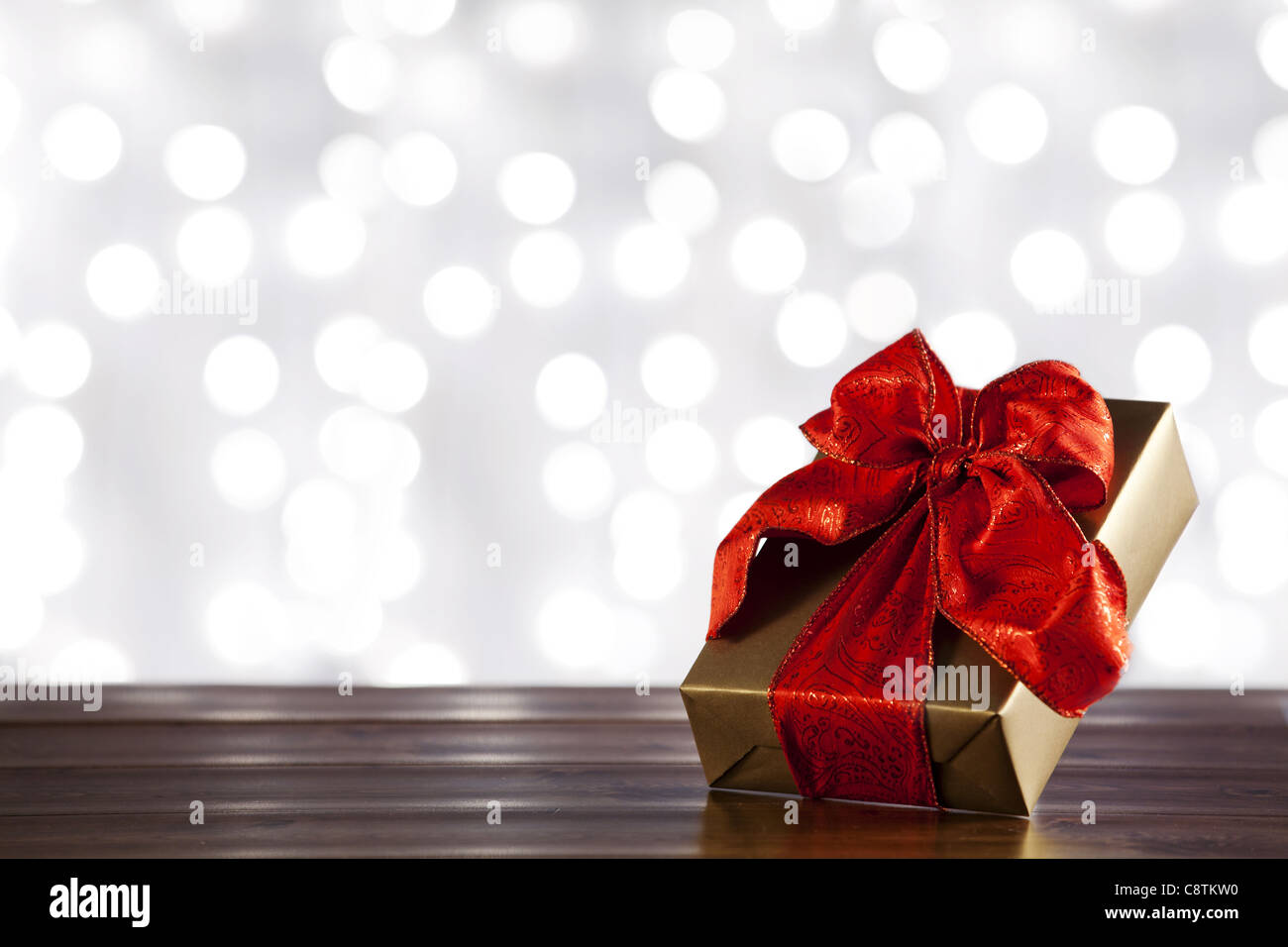Wrapped gift with bow hi-res stock photography and images - Alamy