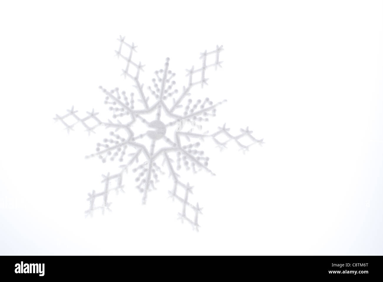 Snowflakes On White Background Stock Photo - Alamy