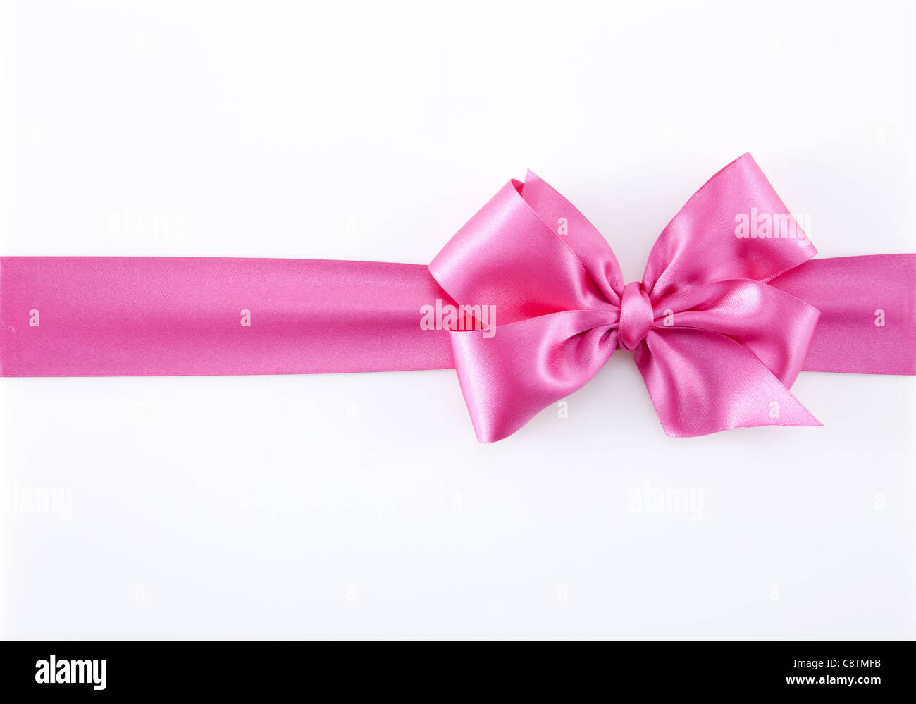 Pink Ribbon With Bow Stock Photo - Alamy