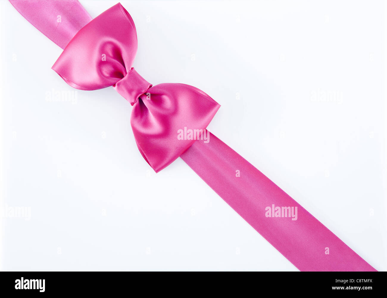 Pink Ribbon With Bow Stock Photo - Alamy