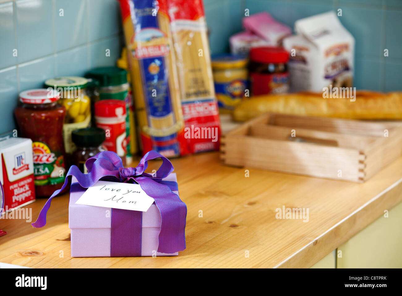 Wrapped Gift Box On The Kitchen Counter Stock Photo - Alamy