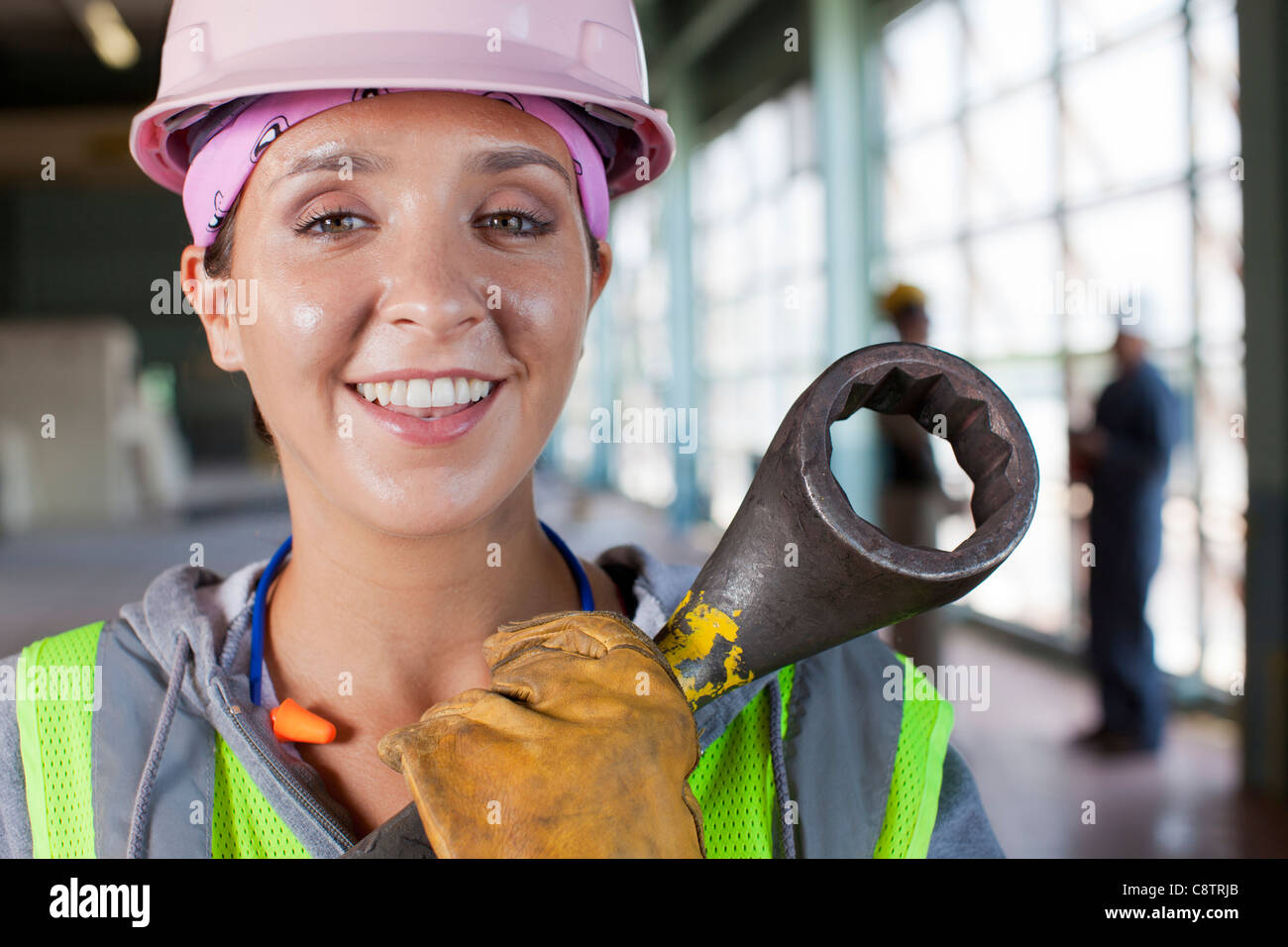 Hispanic worker wearing tool hi-res stock photography and images - Alamy