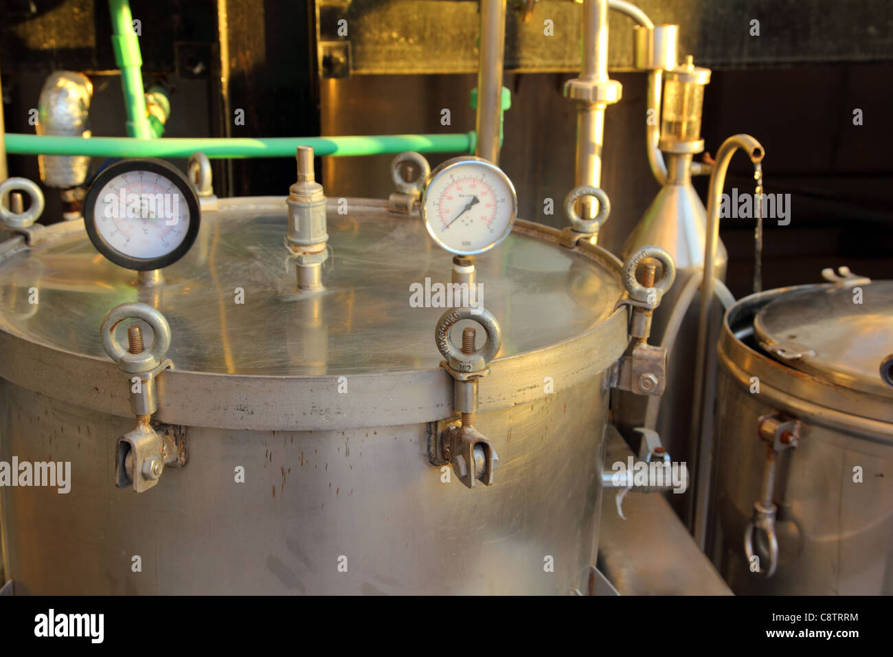 distillation of essential oils in a factory Stock Photo - Alamy