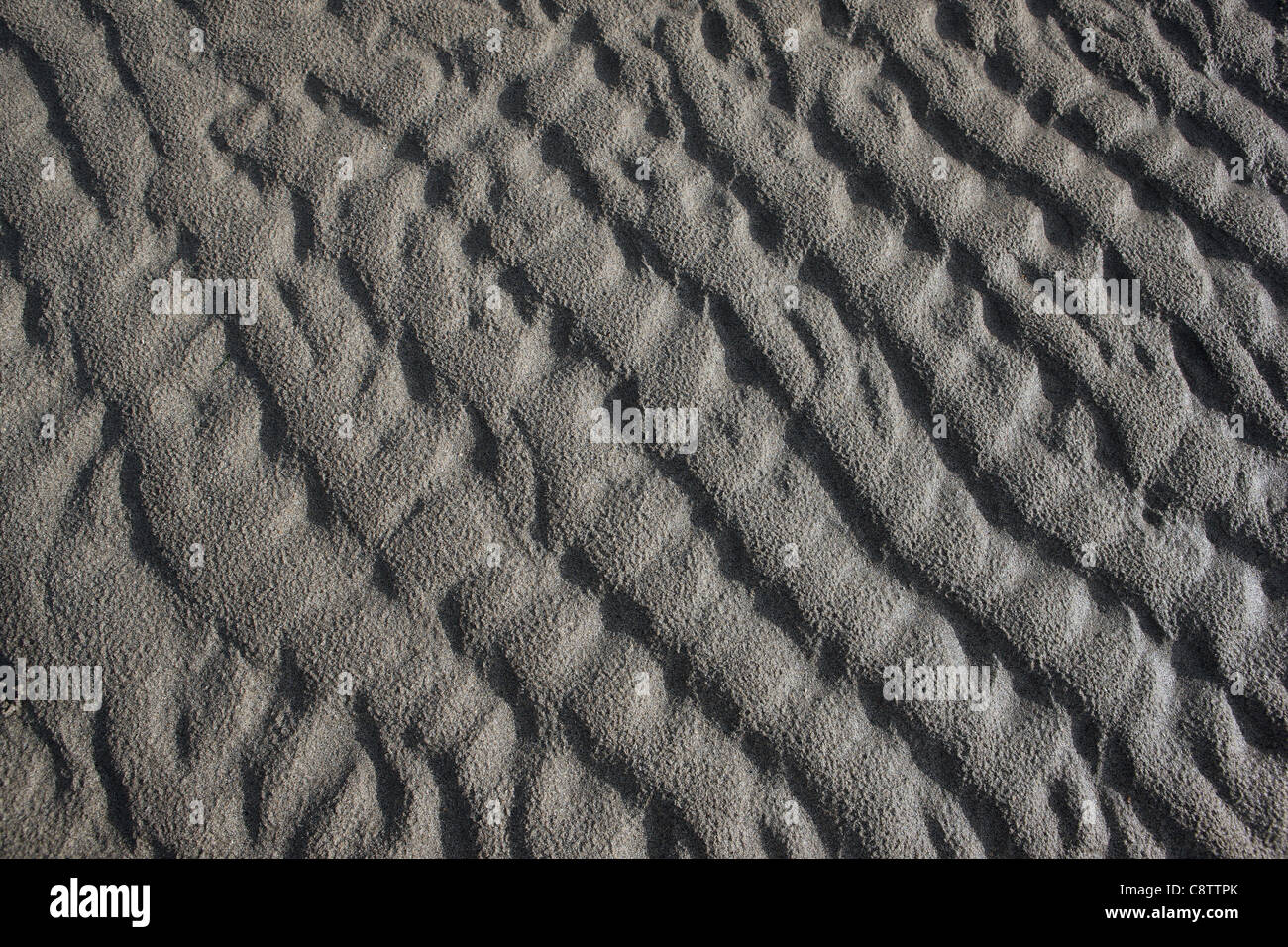 Sand patterns at low tide on Knockvologan beach on the Isle of Mull in ...