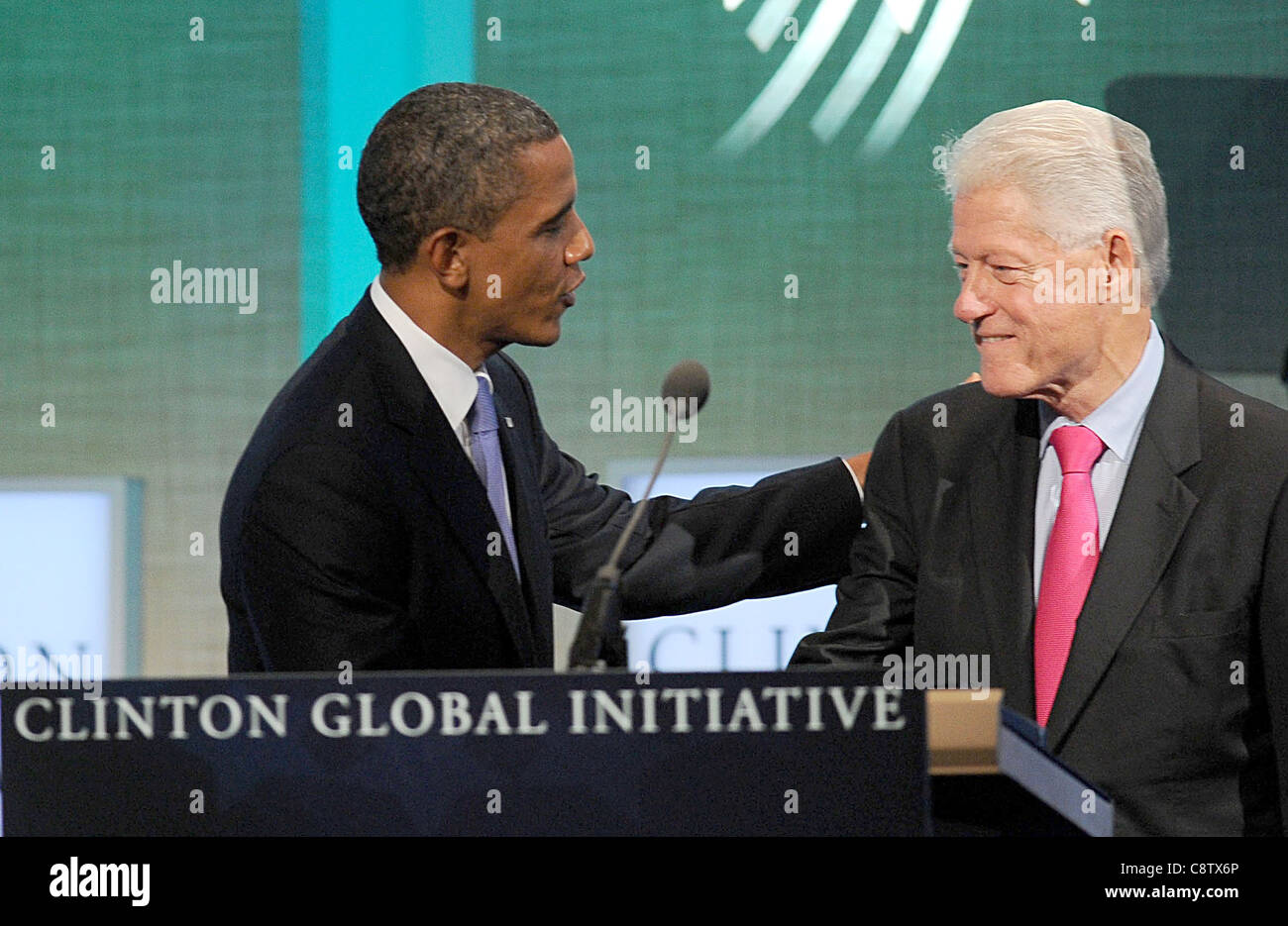Barack Obama, Bill Clinton at a public appearance for 2011 Clinton ...