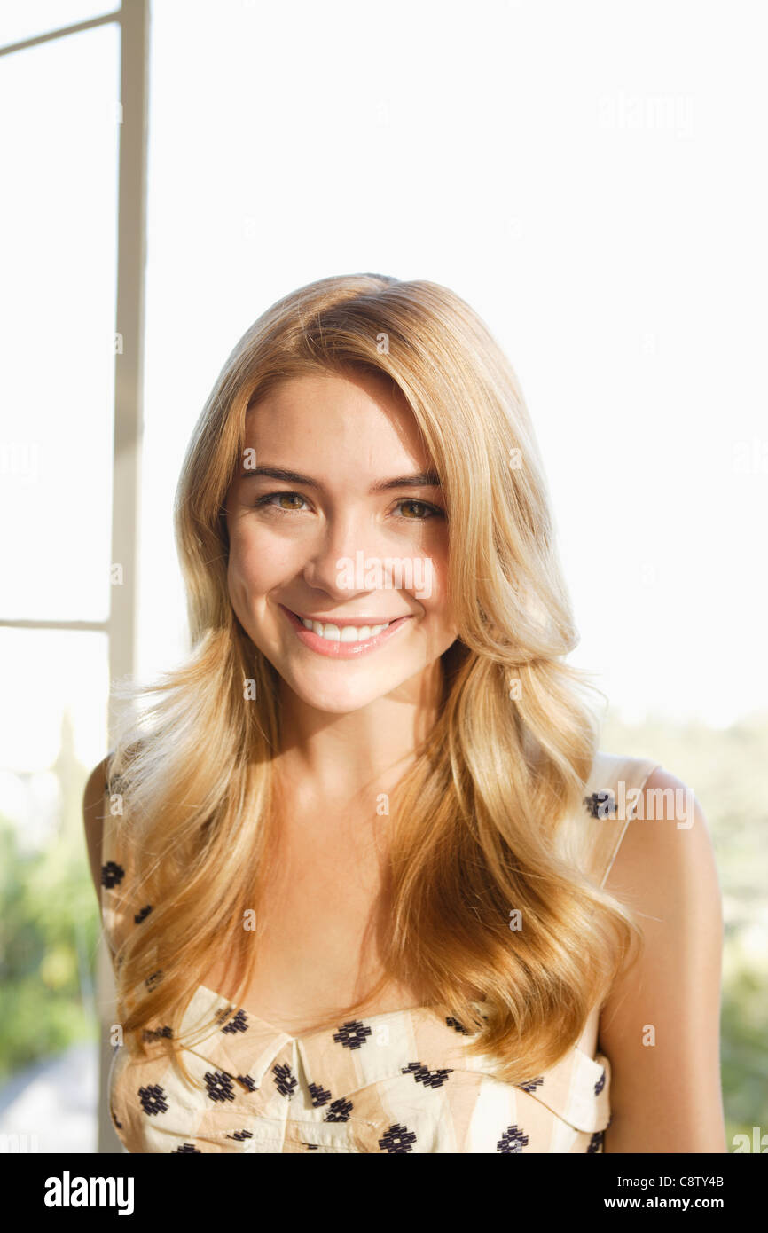 Demure woman hi-res stock photography and images - Alamy