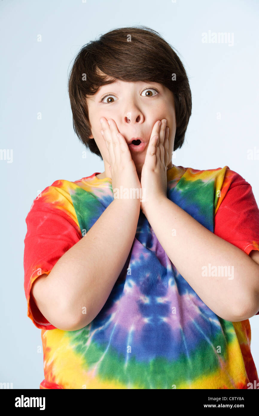 Studio portrait of boy in colorful shirt Stock Photo - Alamy