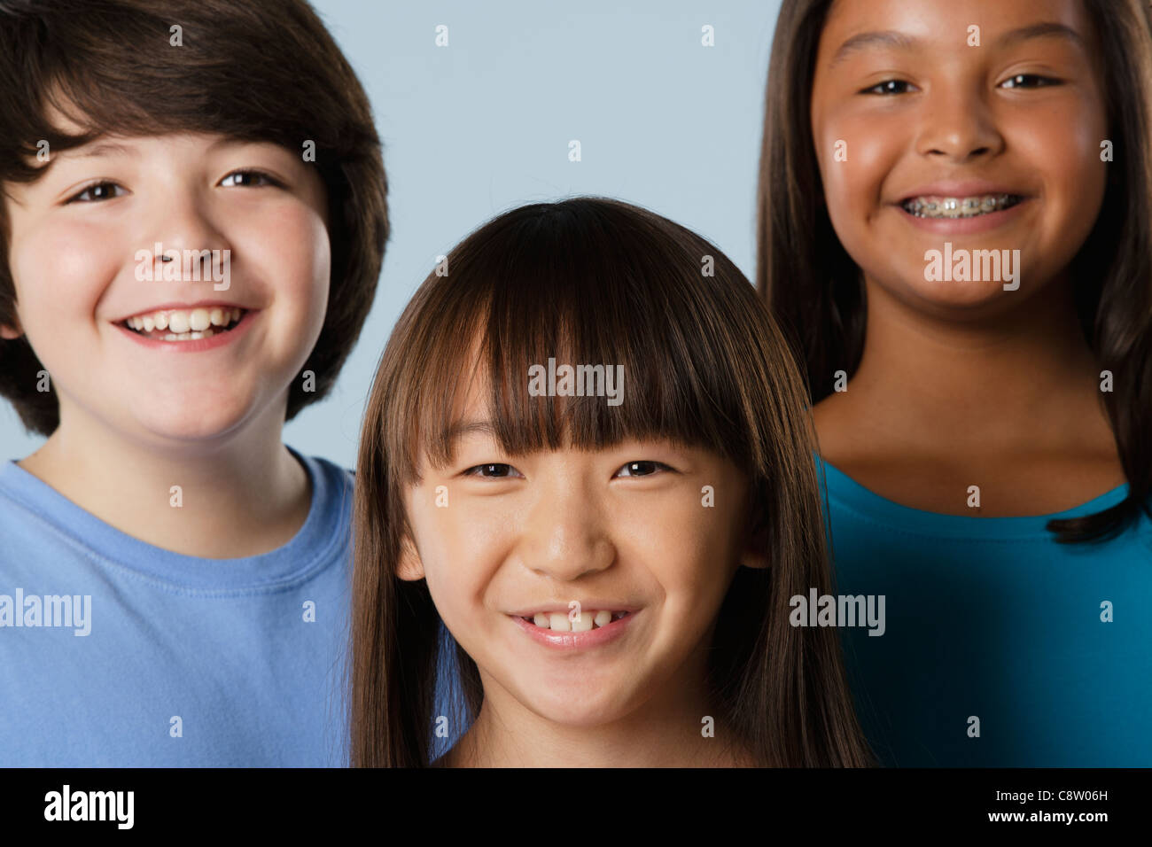 Studio portrait of boy and girls Stock Photo - Alamy