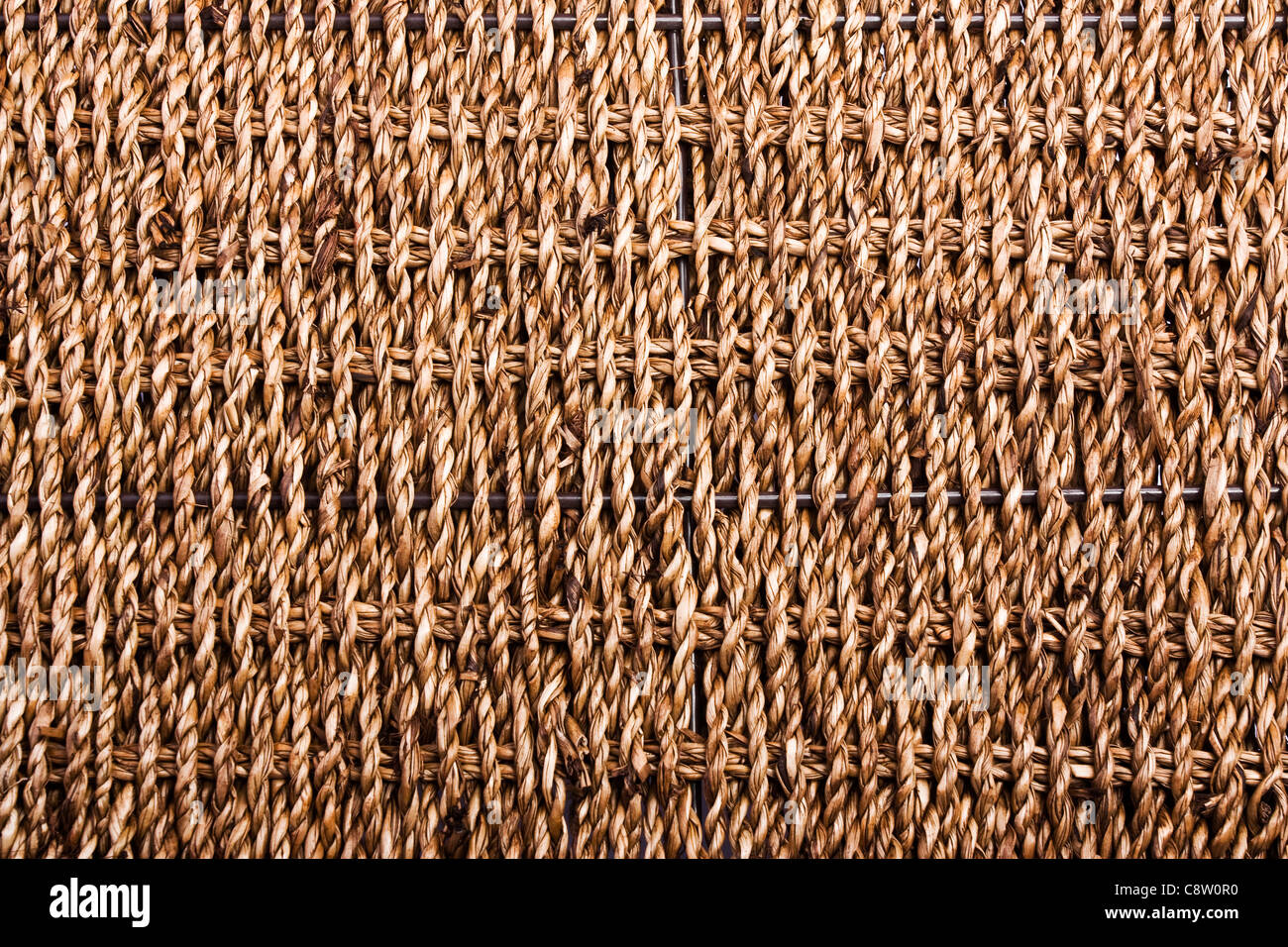 wicker basket on wire construction parallel texture background Stock ...
