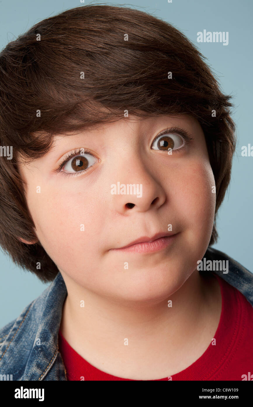 Studio portrait of boy staring at camera Stock Photo - Alamy