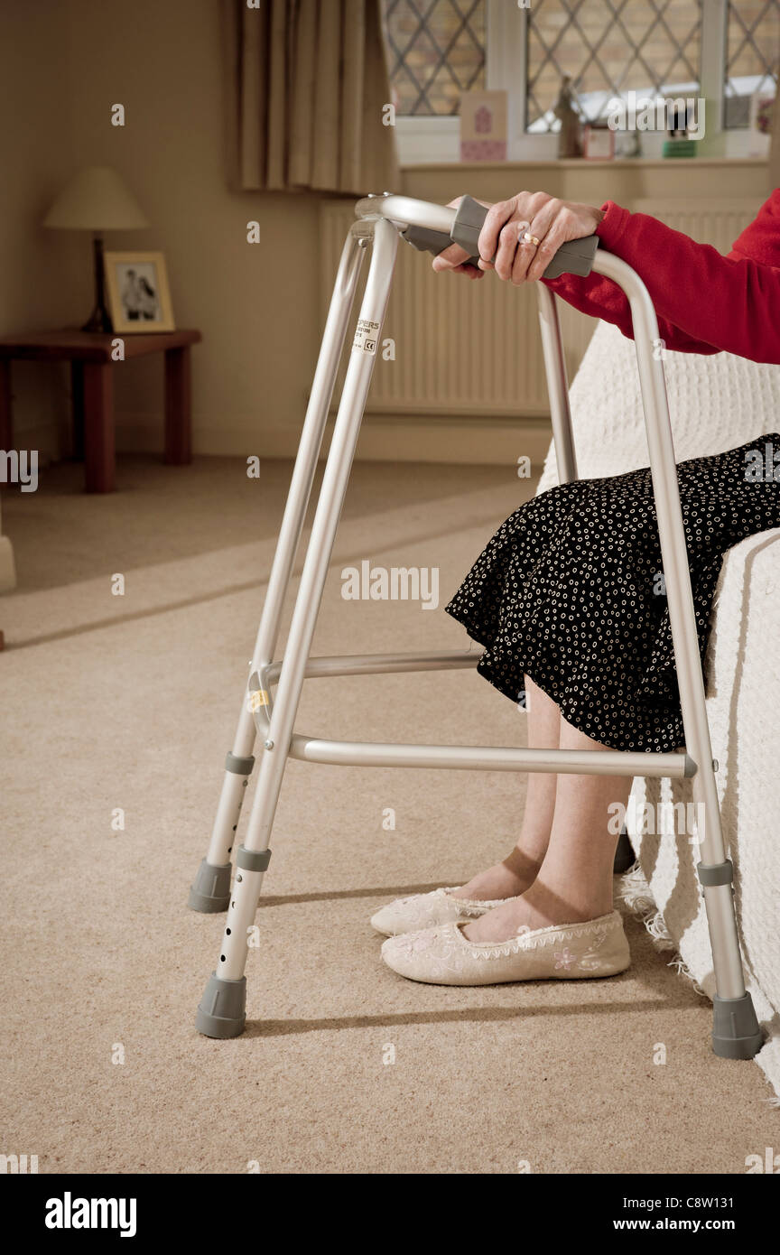 Old woman zimmer frame hi-res stock photography and images - Alamy