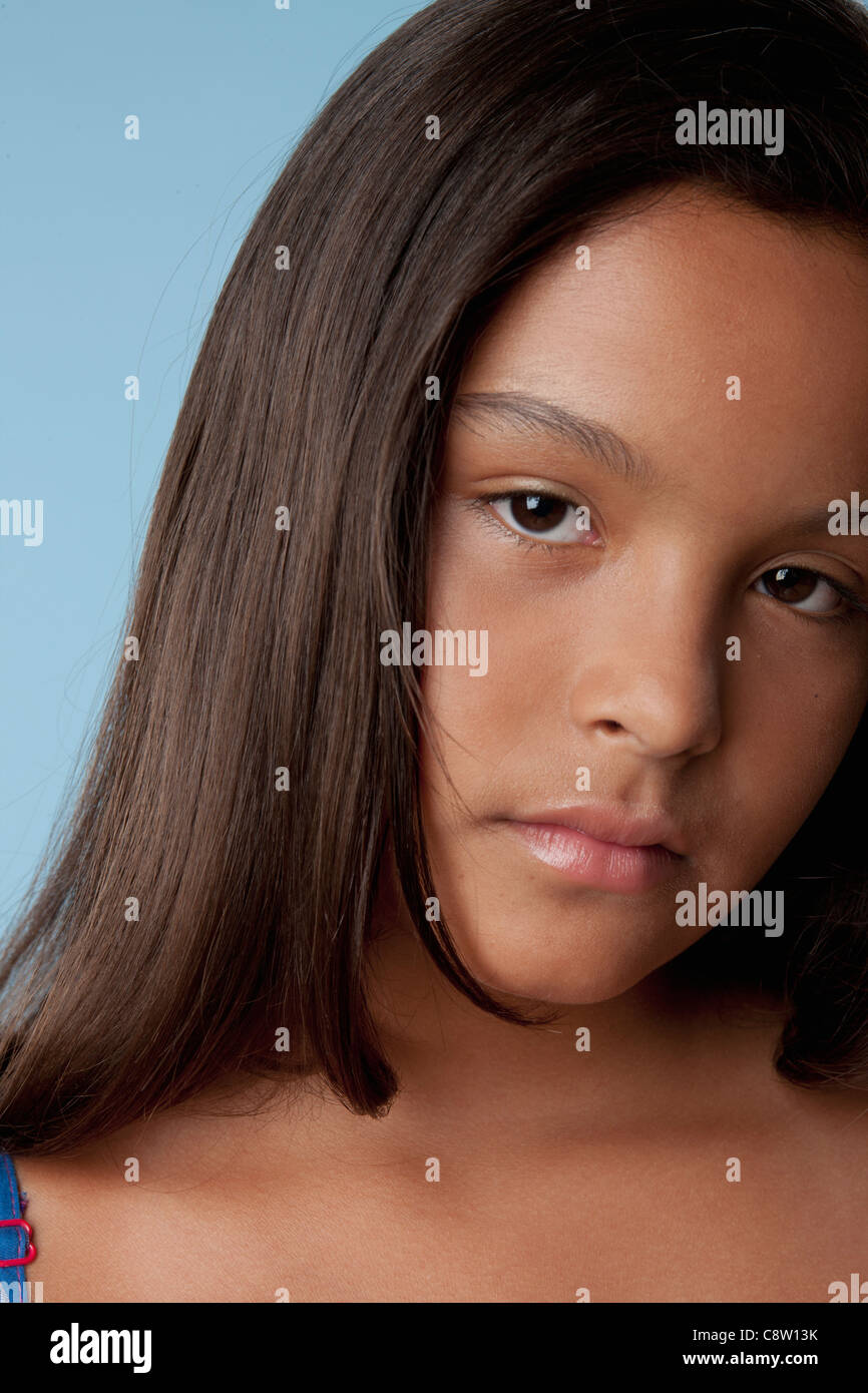 Studio portrait of sad girl Stock Photo - Alamy