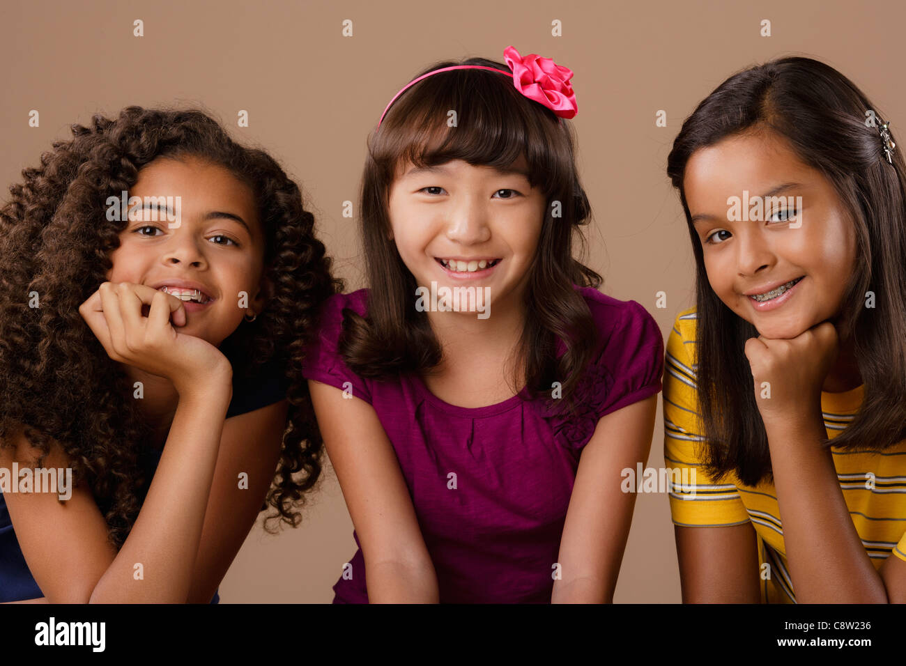 Studio portrait of three girls Stock Photo - Alamy