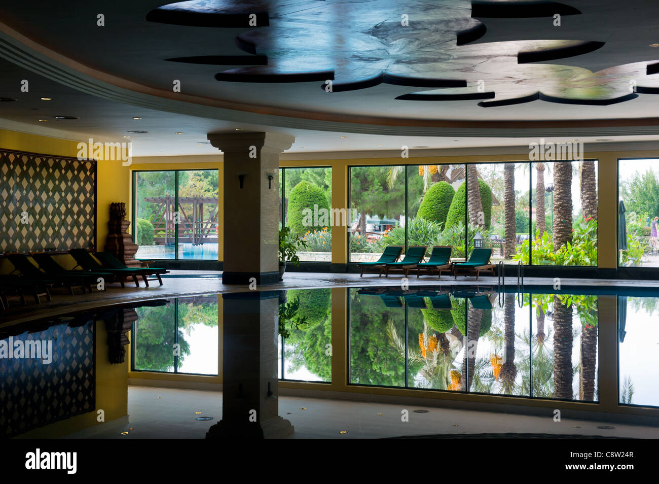 Luxury indoor swimming pool garden Stock Photo - Alamy