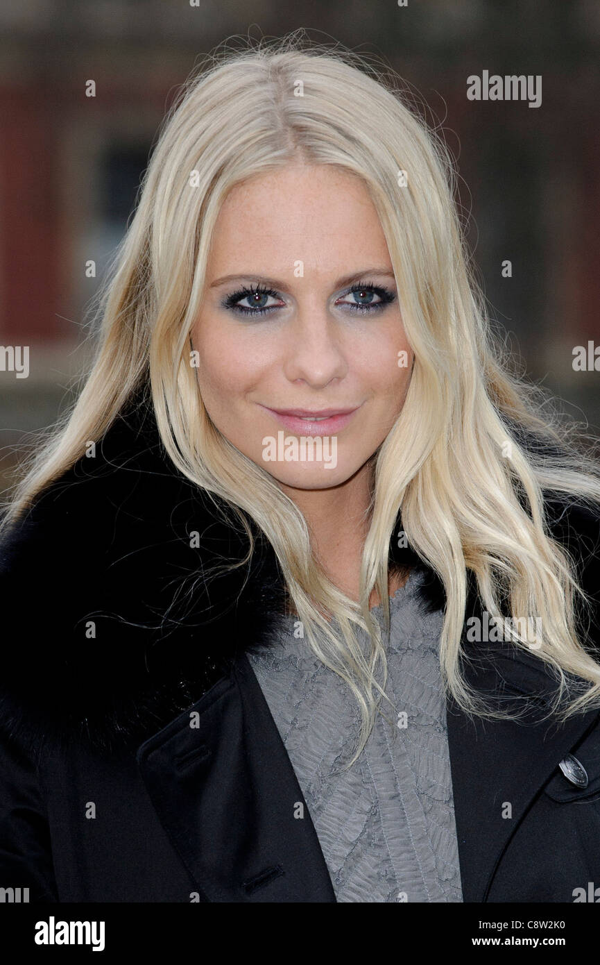 Poppy Delavigne arrives for the Burberry Prorsum fashion show Stock ...