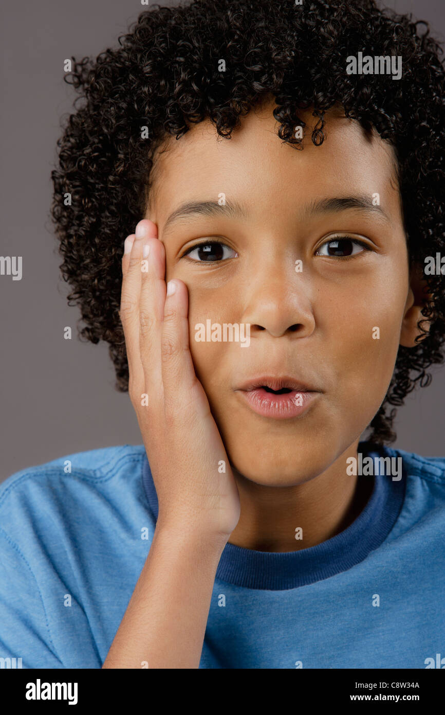 Portrait of surprised boy, studio shot Stock Photo - Alamy