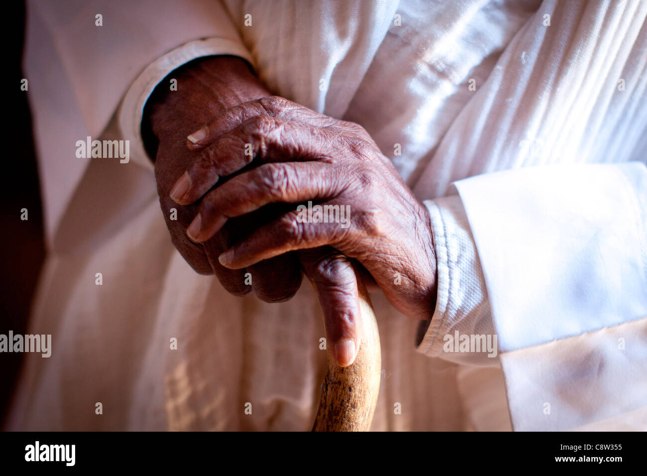 Detail of the hands of an Orthodox Christian priest resting on his ...