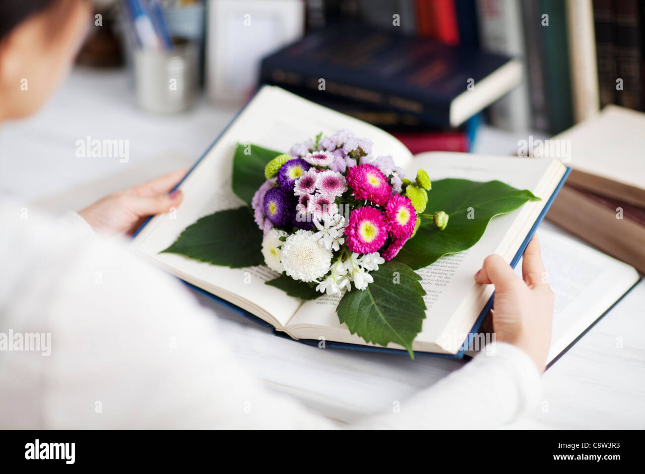Flowers With Books Stock Photo - Alamy