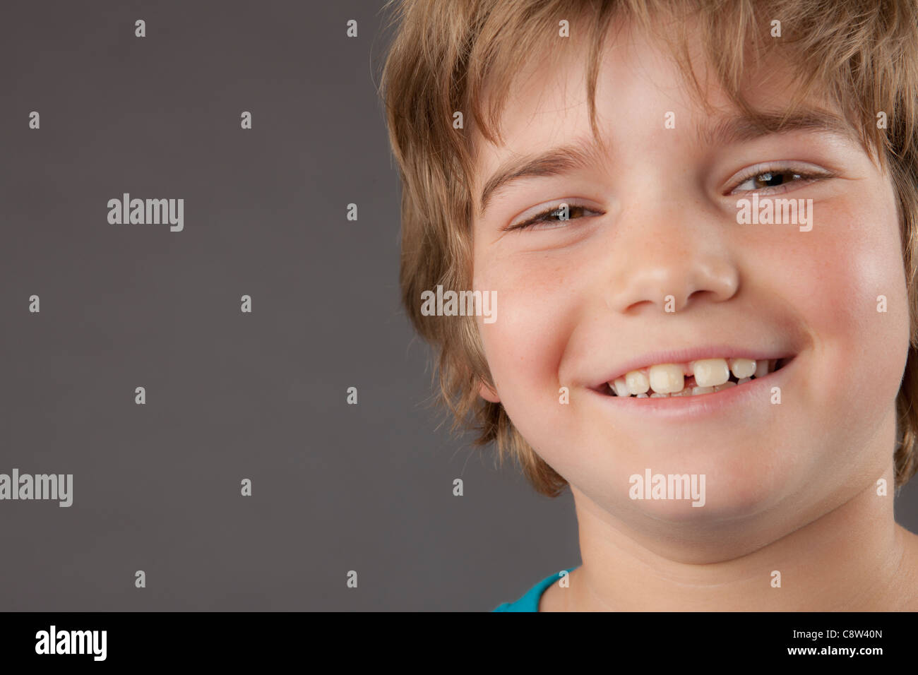 Portrait of smiling boy, studio shot Stock Photo - Alamy