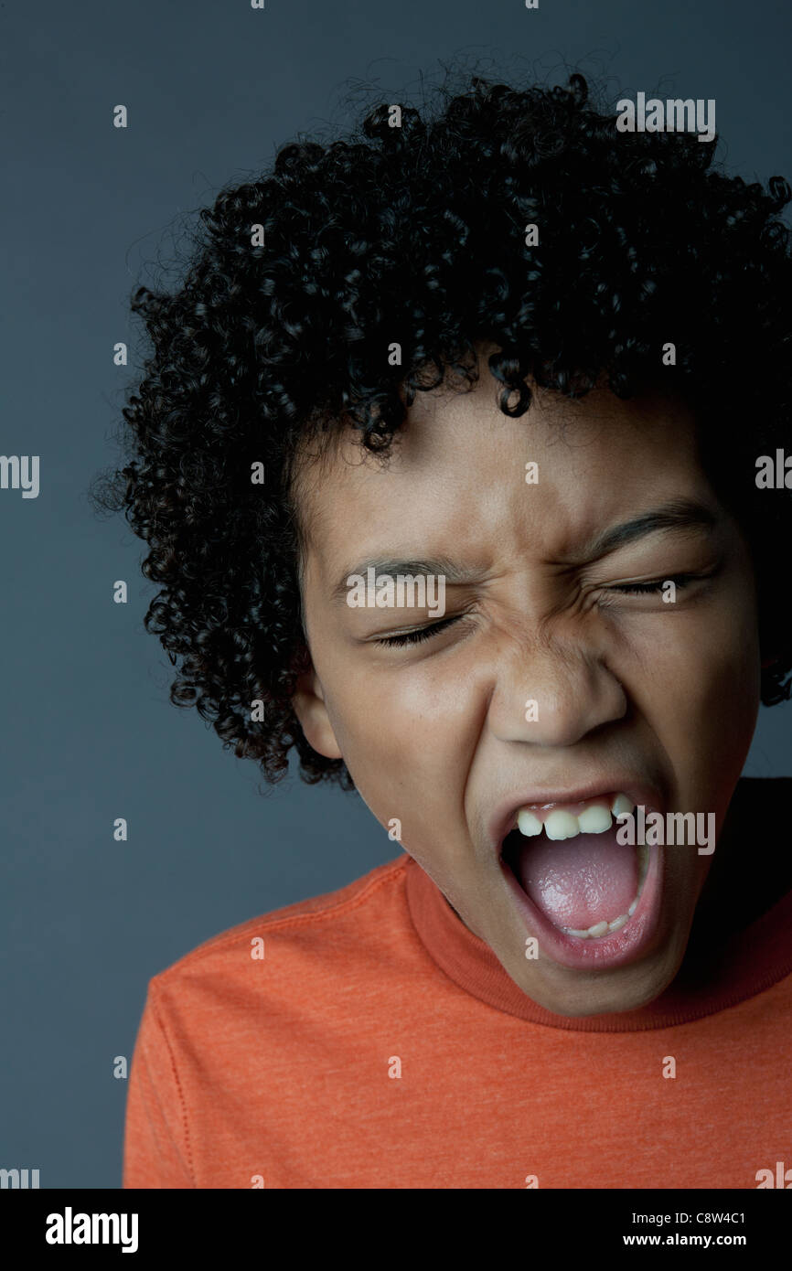 Studio portrait of boy screaming Stock Photo - Alamy