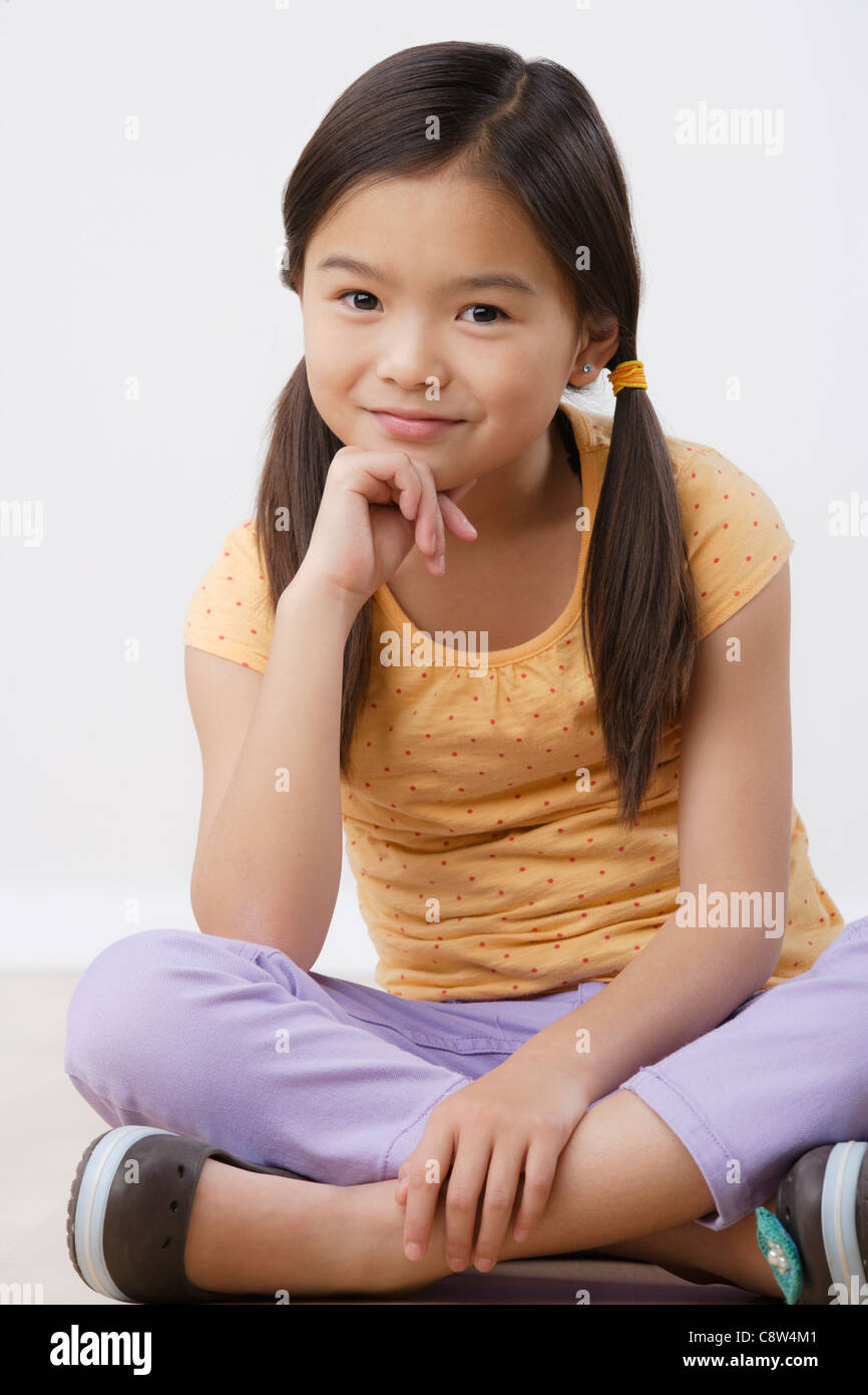 Studio portrait of girl Stock Photo - Alamy