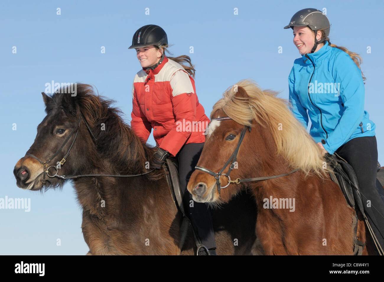 Two riders in blue hi-res stock photography and images - Alamy