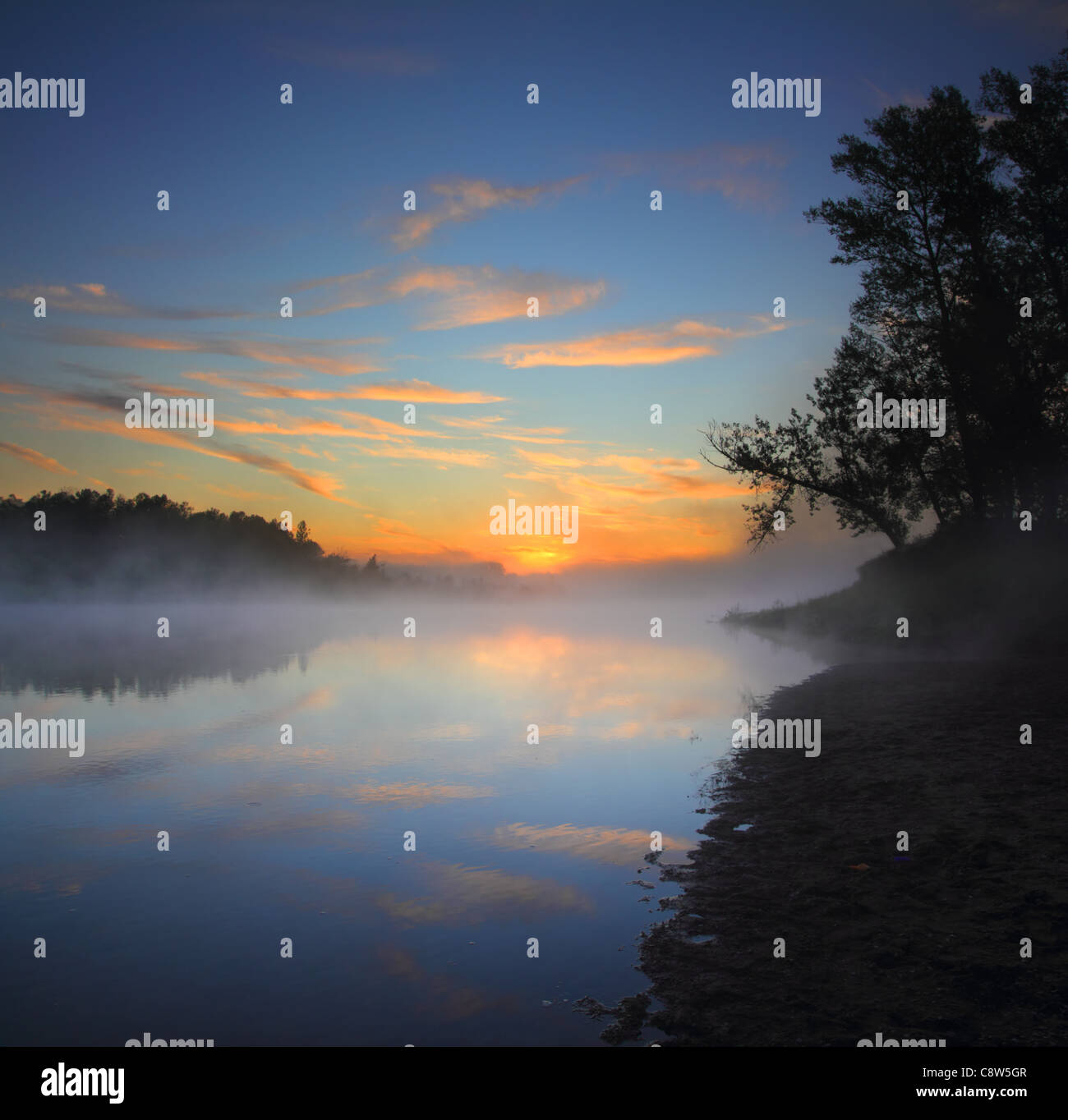 landscape with beautiful fog sunrise on river Stock Photo - Alamy
