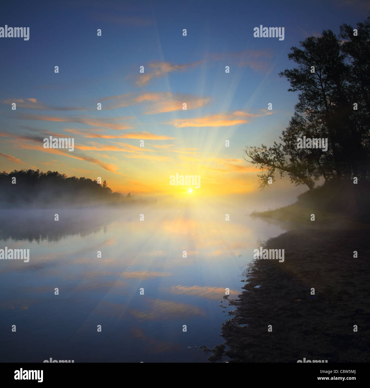 landscape with beautiful fog sunrise on river Stock Photo - Alamy