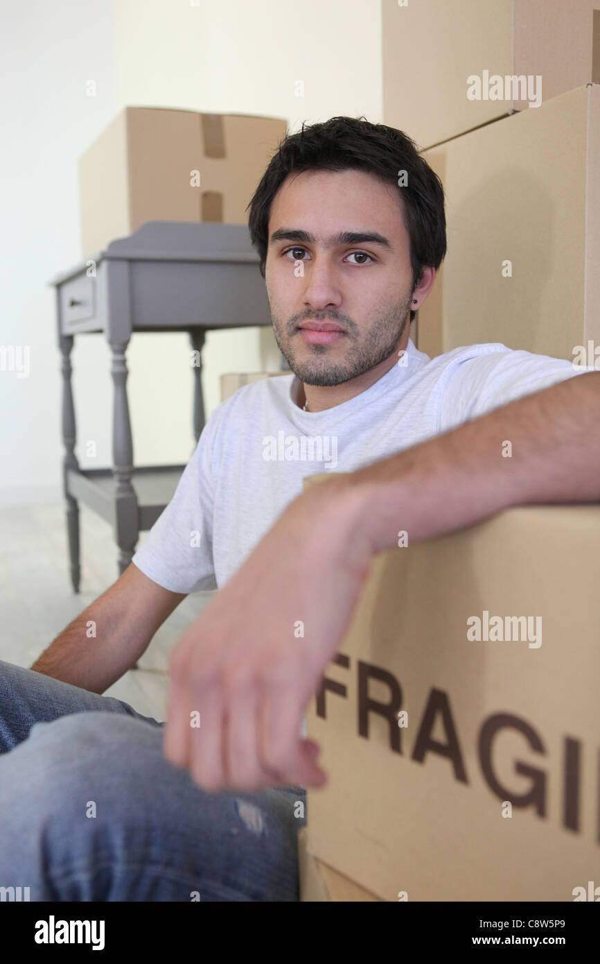 A tired man on moving day Stock Photo - Alamy