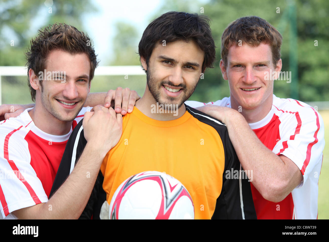 portrait of 3 football players Stock Photo - Alamy