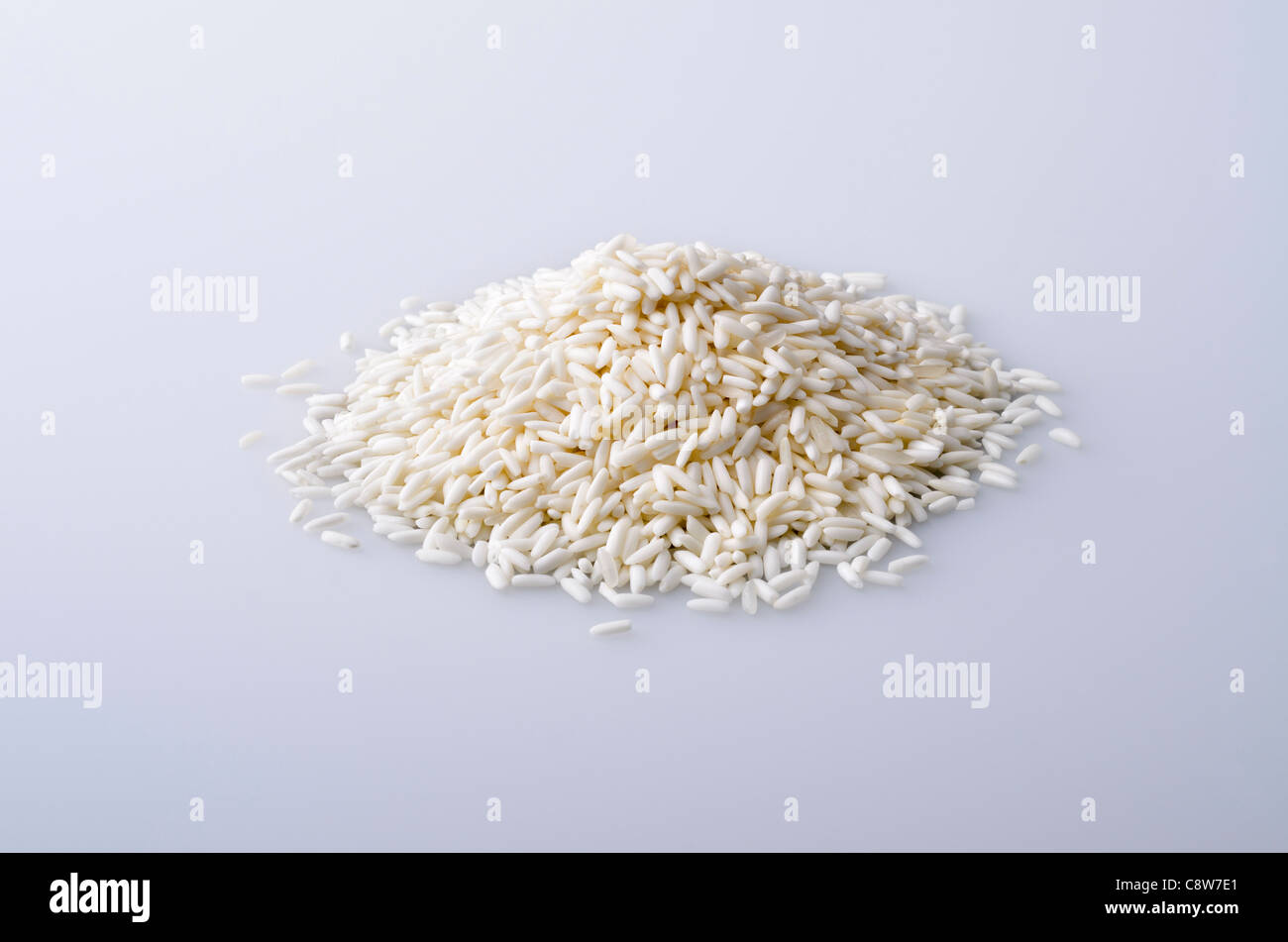 Pile of sticky white rice, uncooked Stock Photo - Alamy