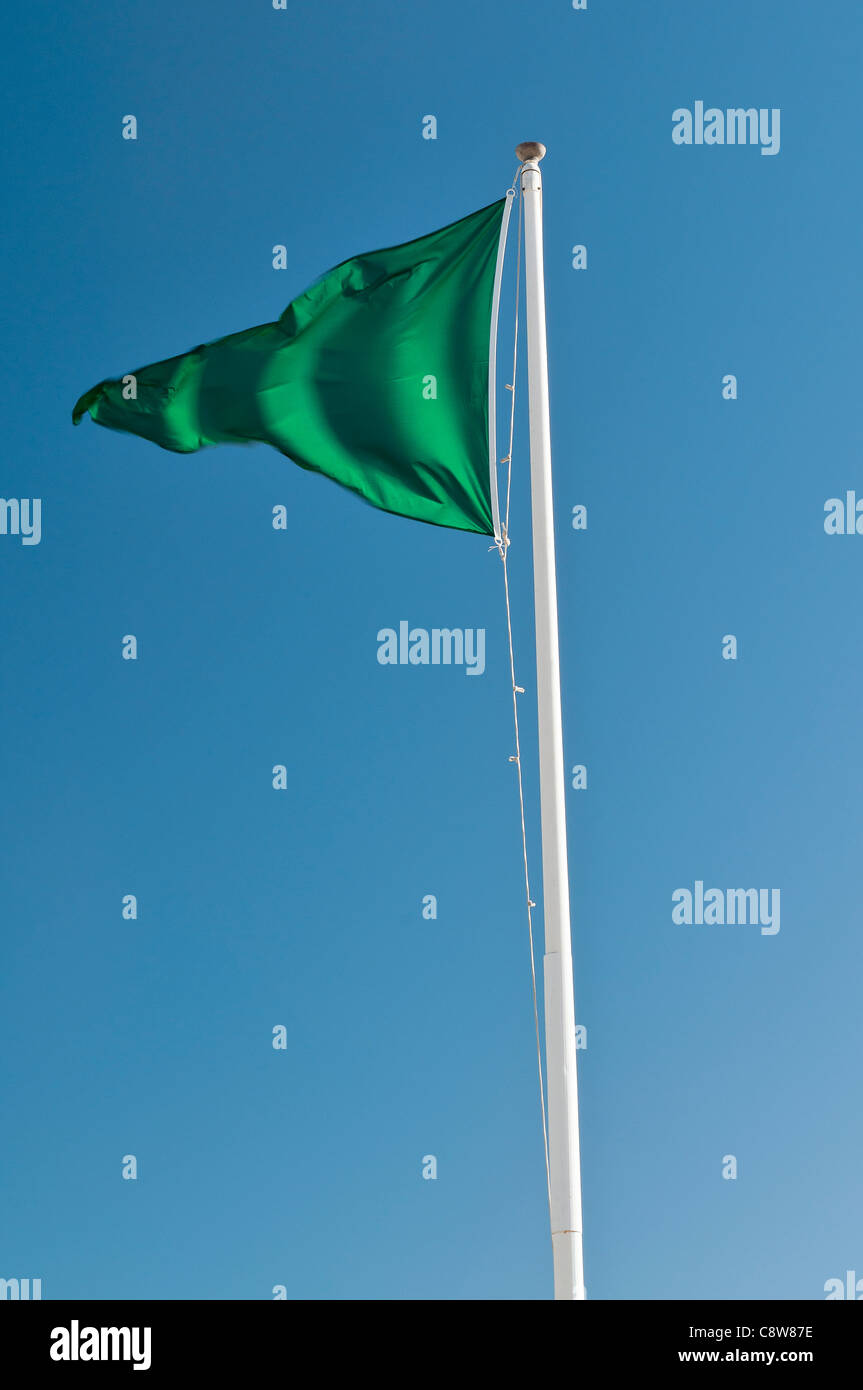Green flag flying hi-res stock photography and images - Alamy