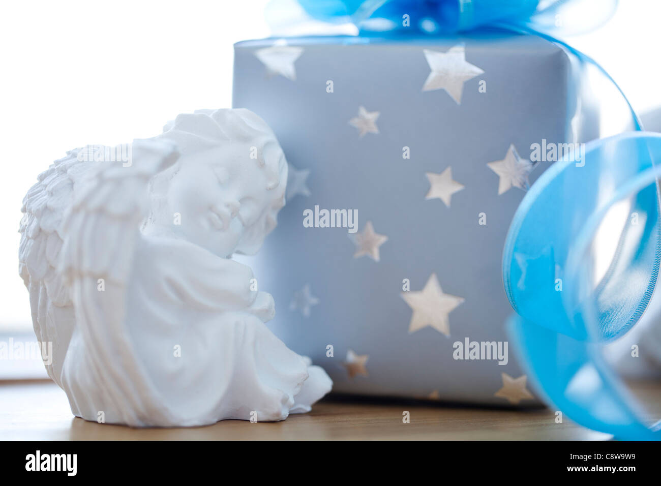 Angel gift hi-res stock photography and images - Alamy
