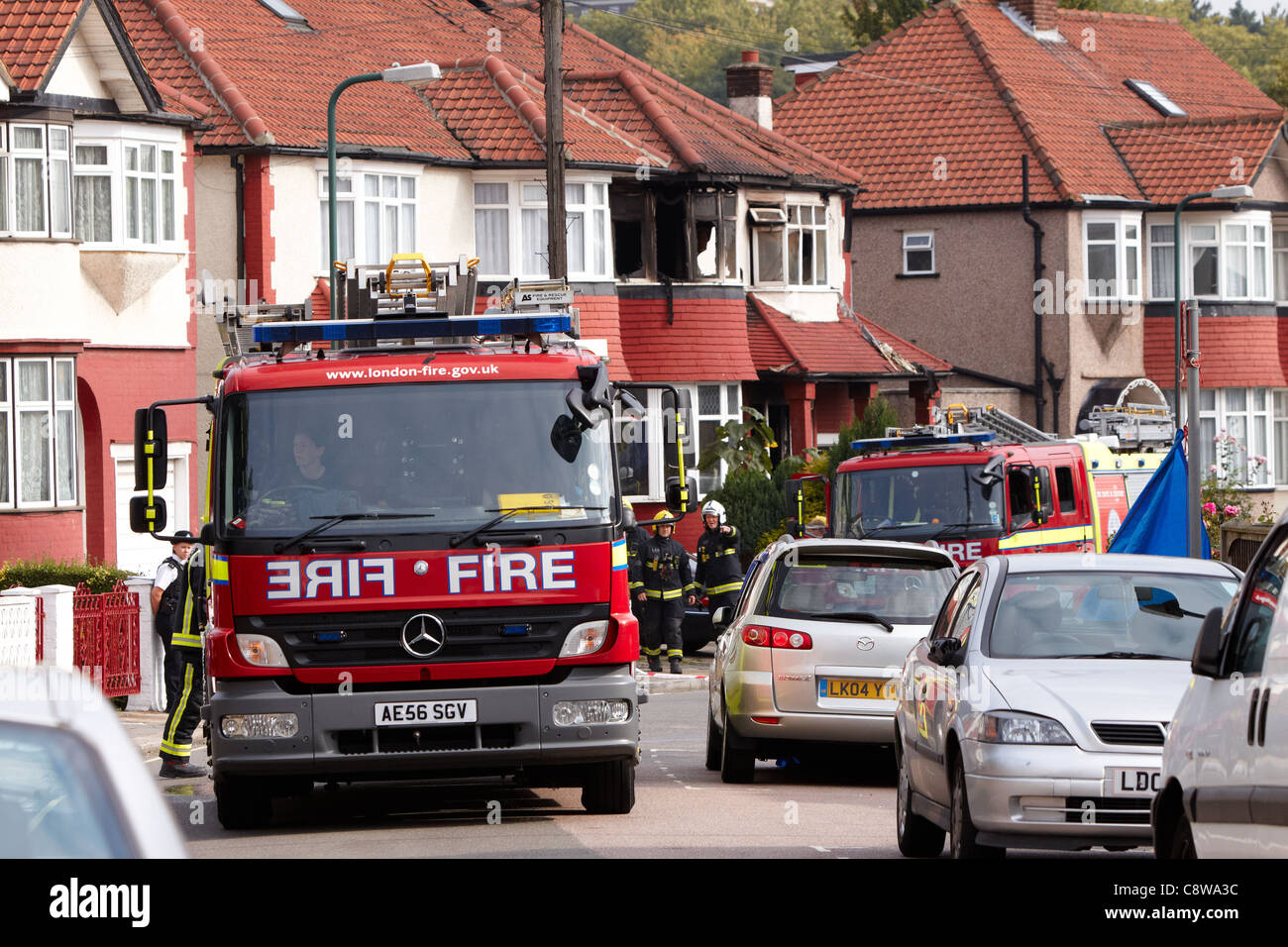 LFB fire engine at the scene of a house fire in Neasden, north London ...