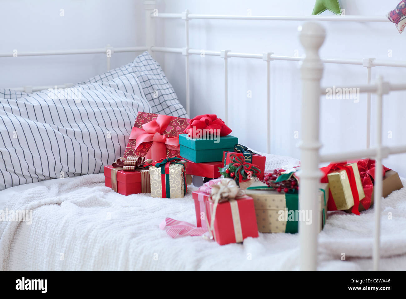 Wrapped Gift Boxes On Couch Stock Photo - Alamy