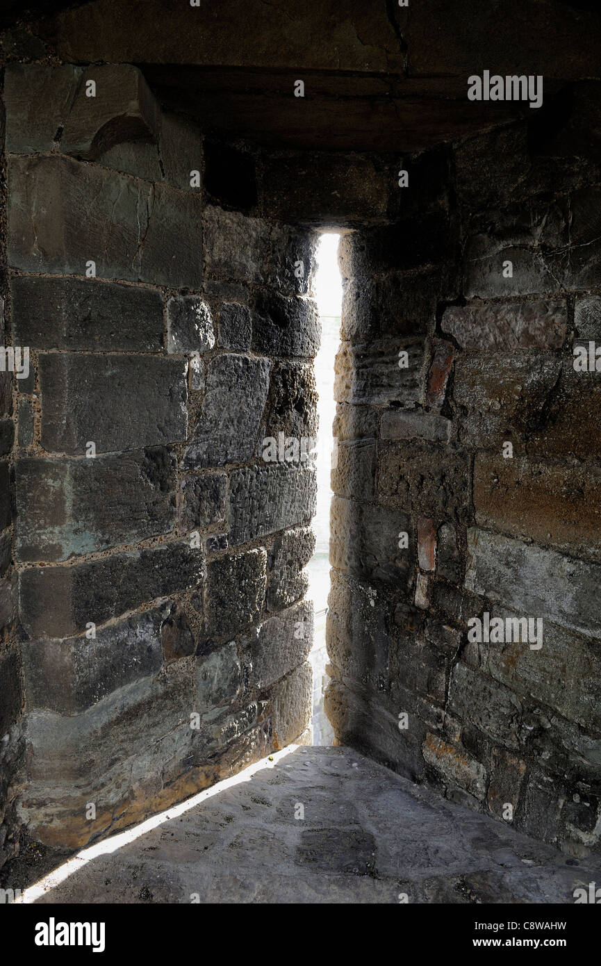 arrow loop window caernarfon castle gwynedd wales Stock Photo - Alamy