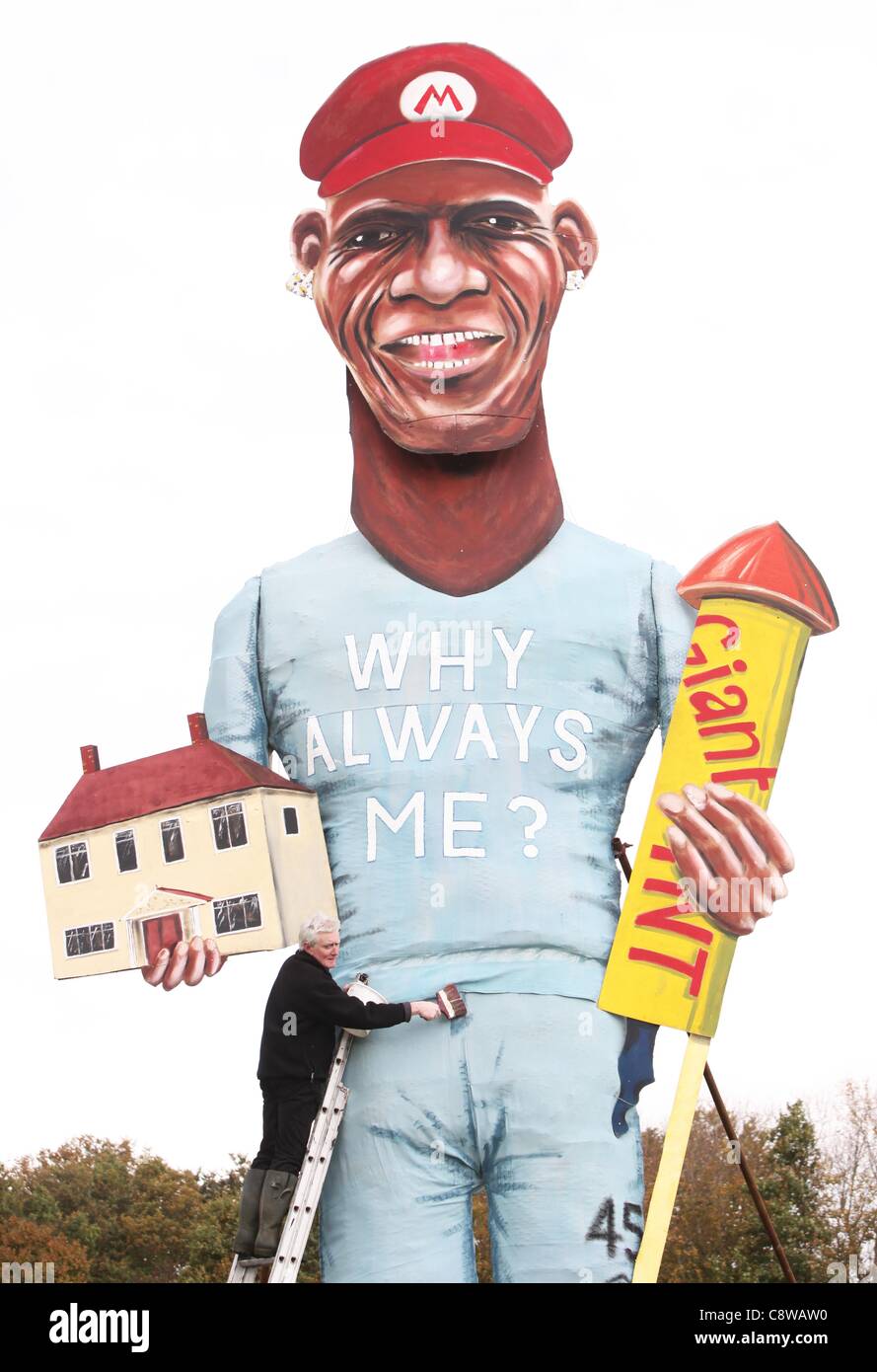 Artist Frank Shepherd puts the finishing touches to an giant 30ft ...