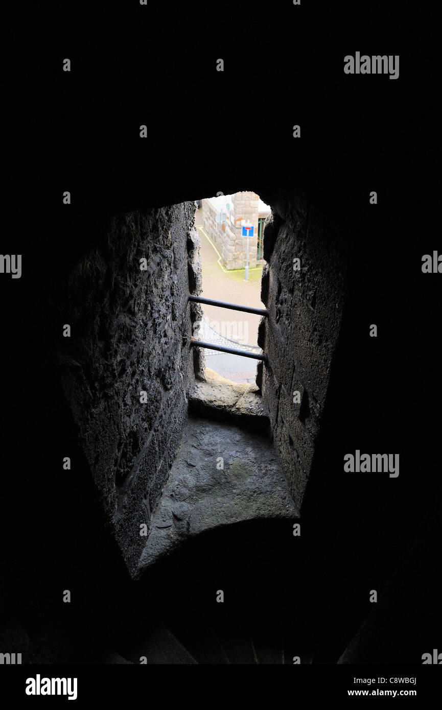narrow window caernarfon castle gwynedd north wales uk Stock Photo - Alamy