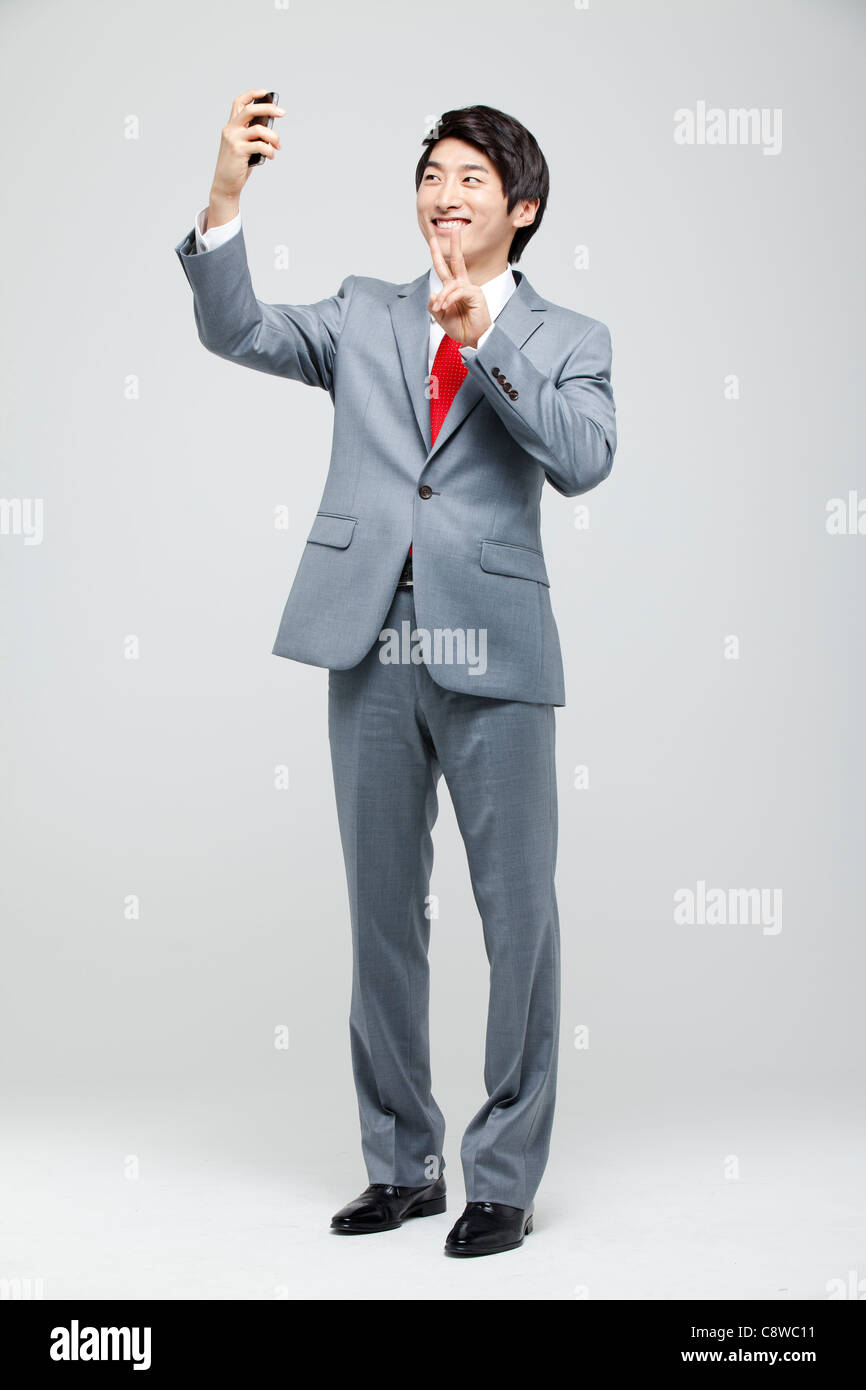Black man making peace sign hi-res stock photography and images - Alamy