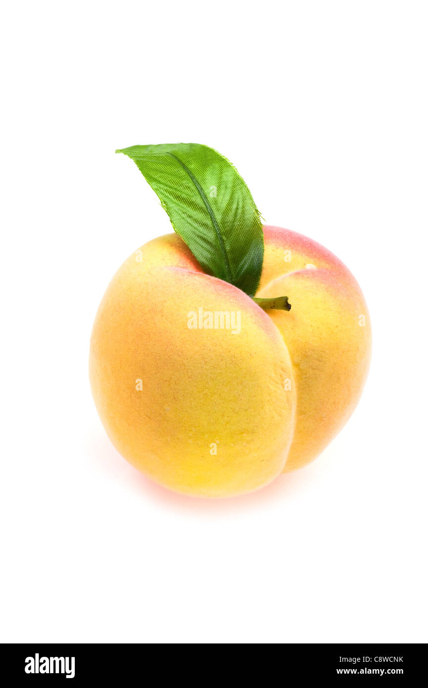 object on white - plastic peach close up Stock Photo - Alamy